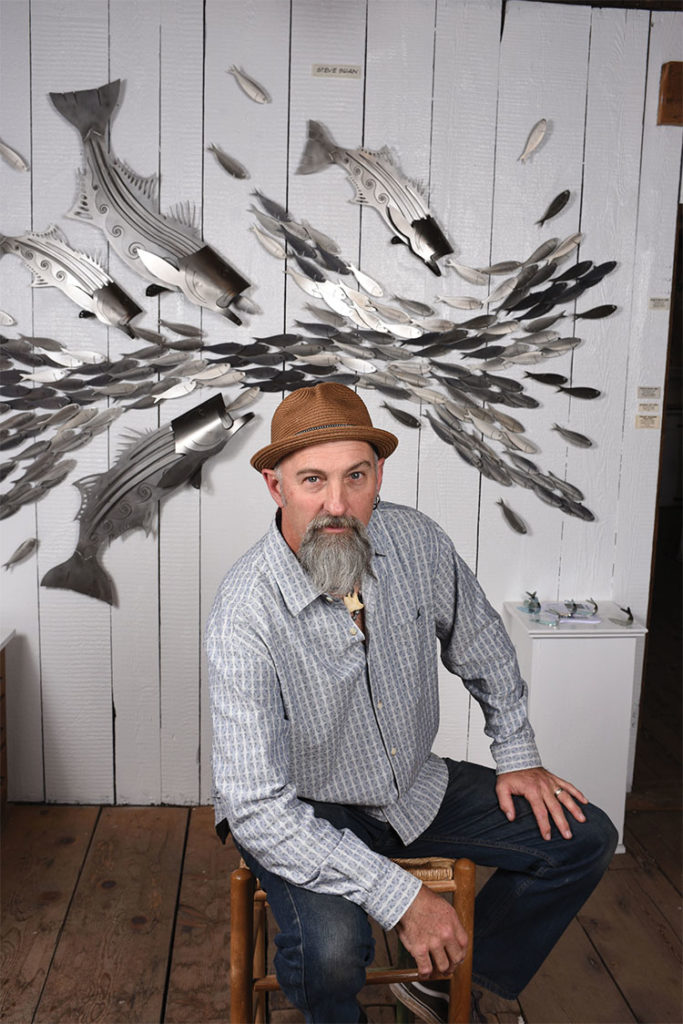 Metal sculptor Steve Swain creates unique schools of fish